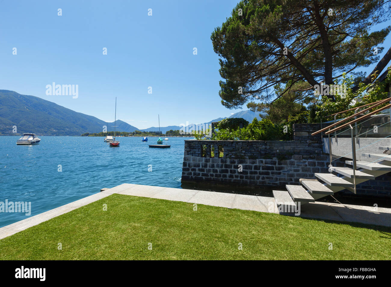 Architecture outdoor terrace overlooking the lake, with garden Stock ...