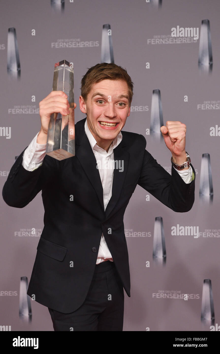 Actor Jonas Nay holds up his award for best actor after the German ...