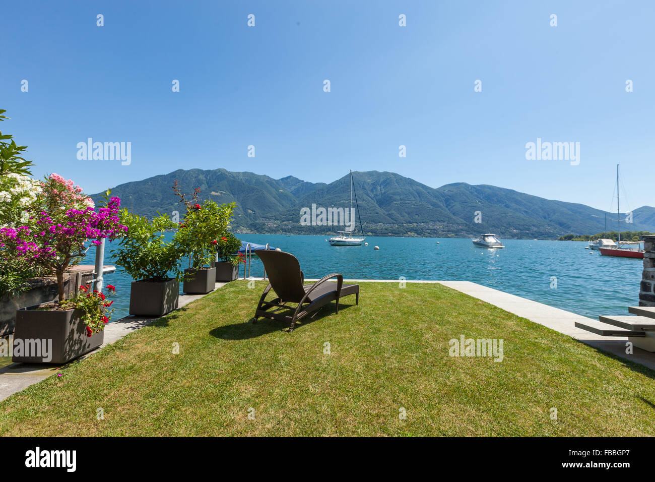 Architecture outdoor terrace overlooking the lake, with garden Stock ...
