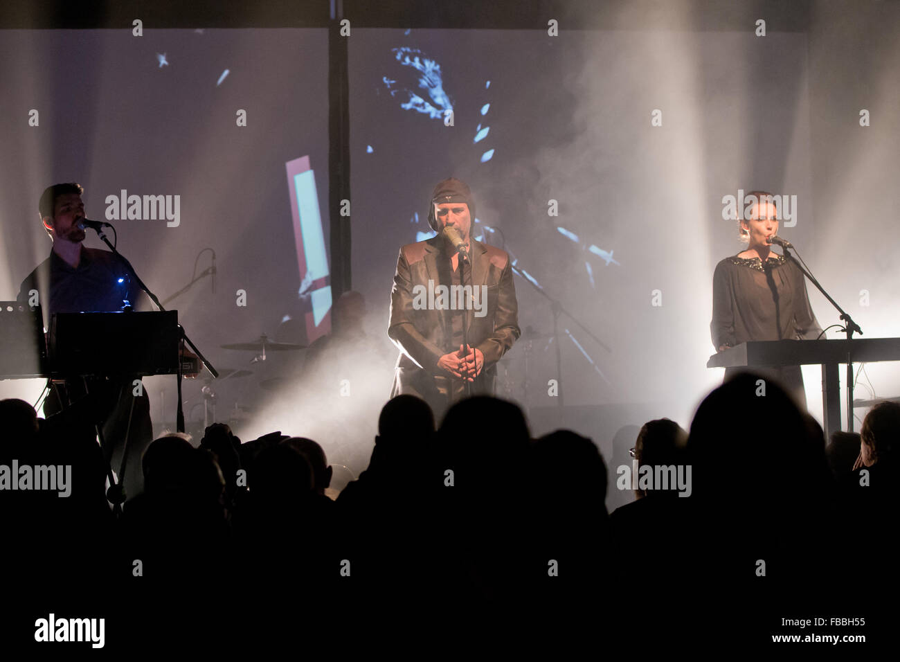 Singer from the Slovenian band Laibach, Milan Fras (C), stands on stage ...