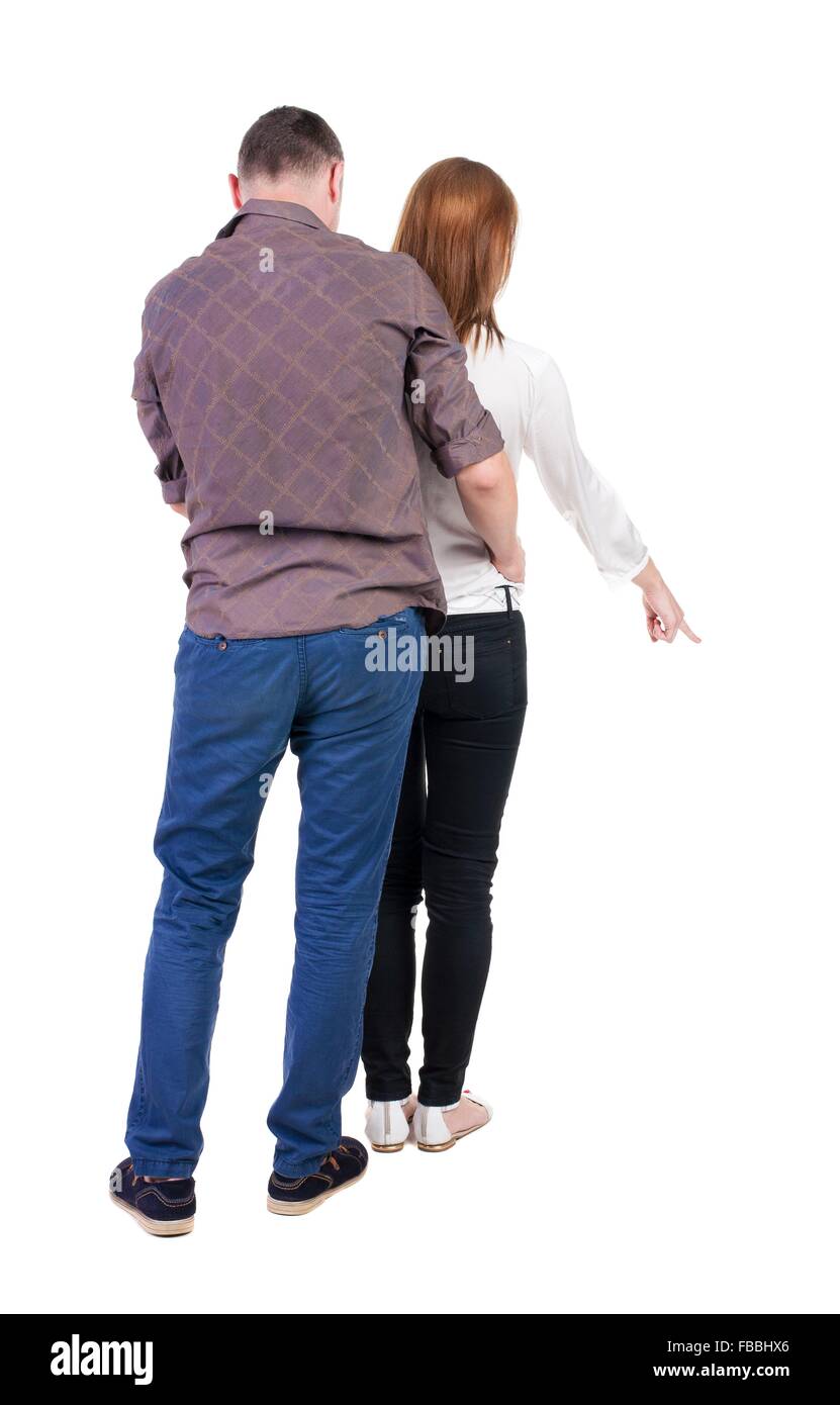 young couple pointing. Back view. Rear view people collection. backside ...