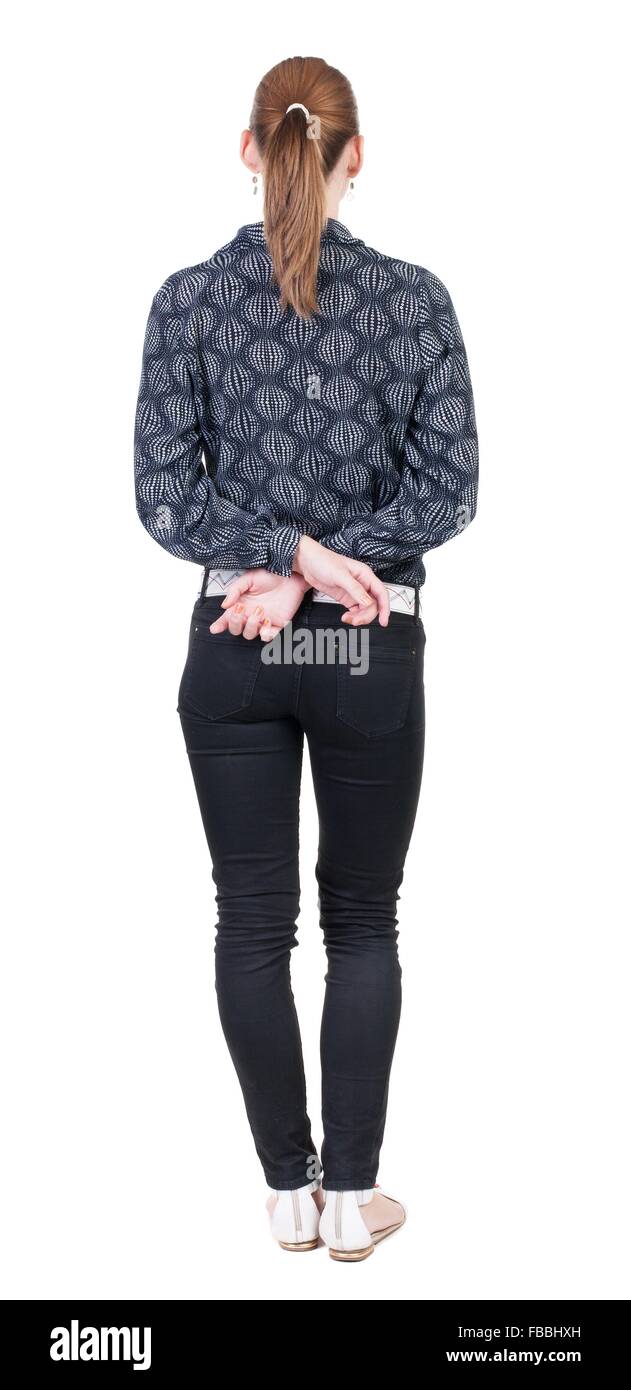 back view of standing young beautiful blonde woman in jeans. girl ...