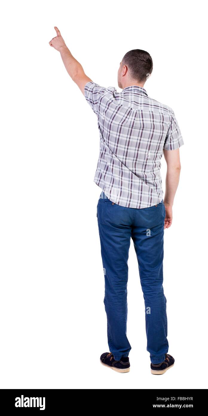 Back view of pointing young men in shirt and jeans. Young guy gesture ...