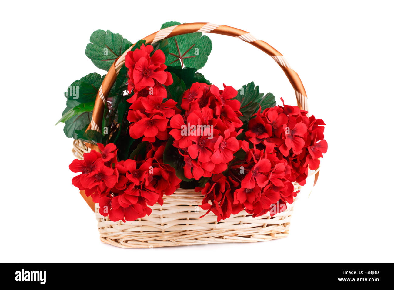 Red fabric flowers in wicker basket isolated on white background Stock ...