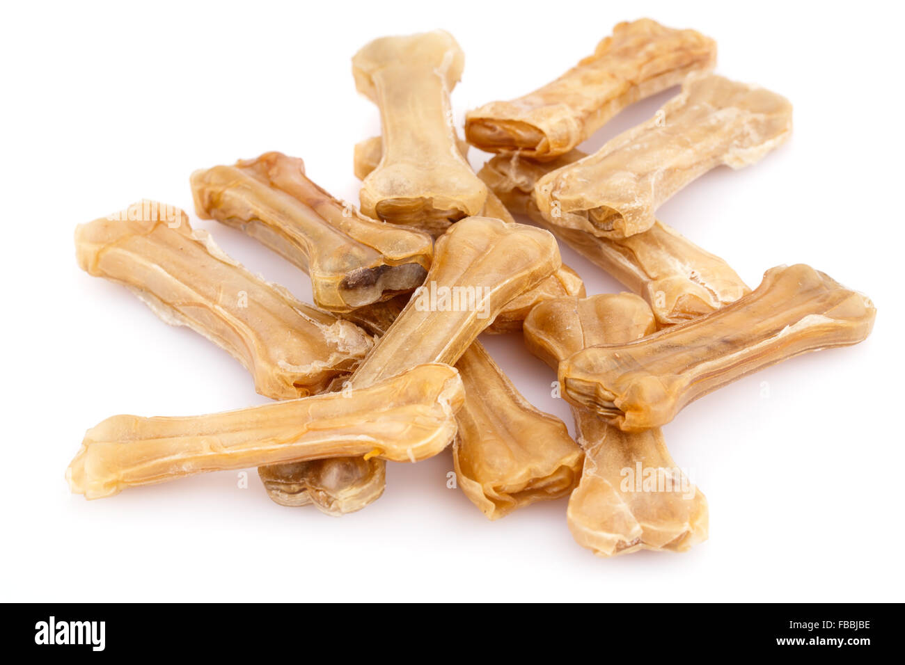 Dog bones isolated on white background Stock Photo - Alamy