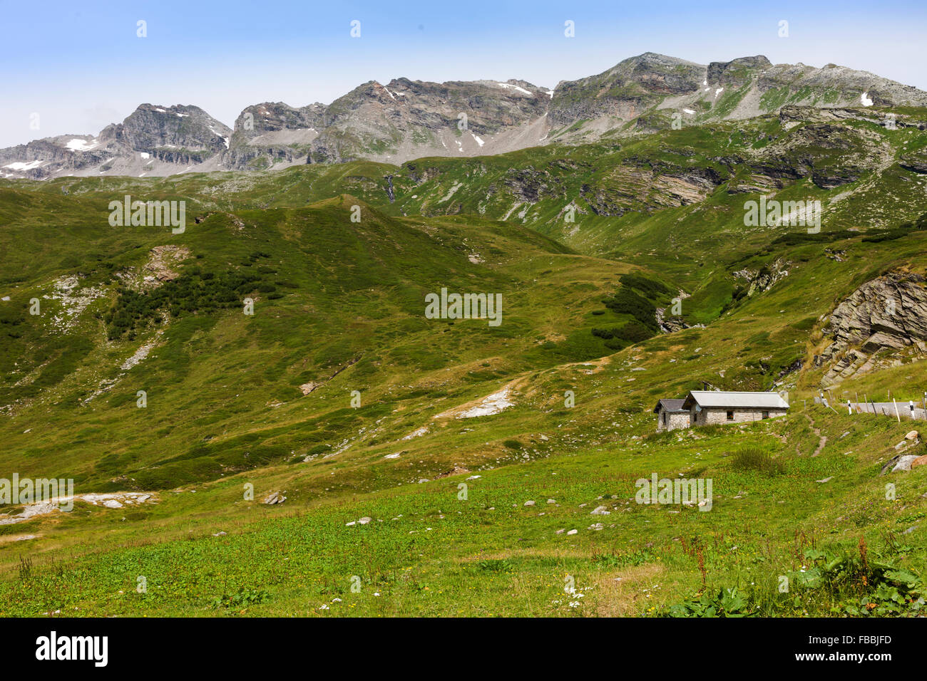 Typical European Alpine landscape, pastures and mountains Stock Photo ...