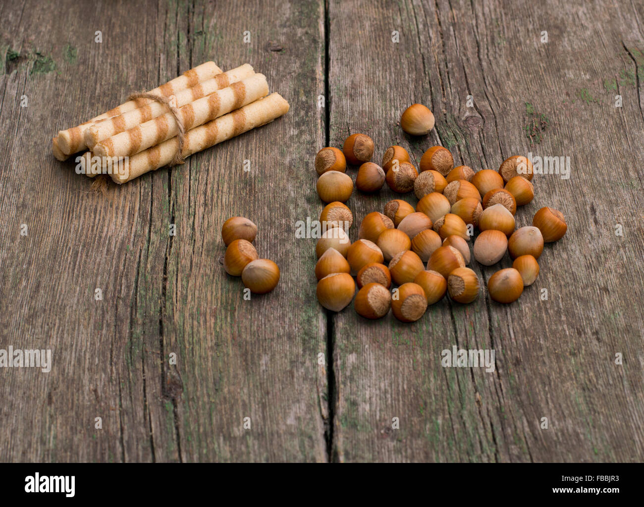 the linking of cookies and forest nutlets scattered on a table Stock ...