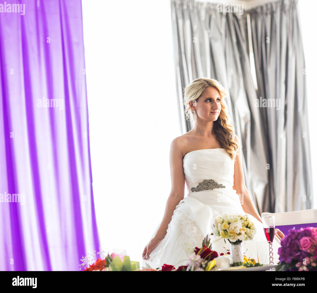 Happy bride and groom on their wedding reception Stock Photo - Alamy