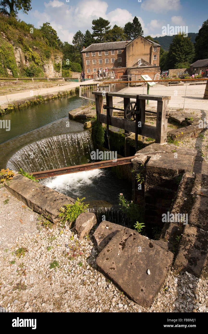UK, England, Derbyshire, Cromford Mill, weir controlling water level to ...