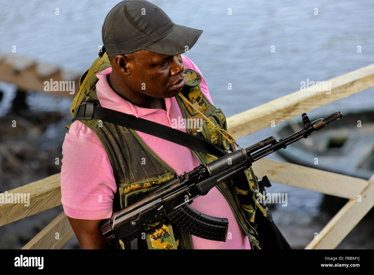 Panamanian soldier embarks on canoe hi-res stock photography and images ...