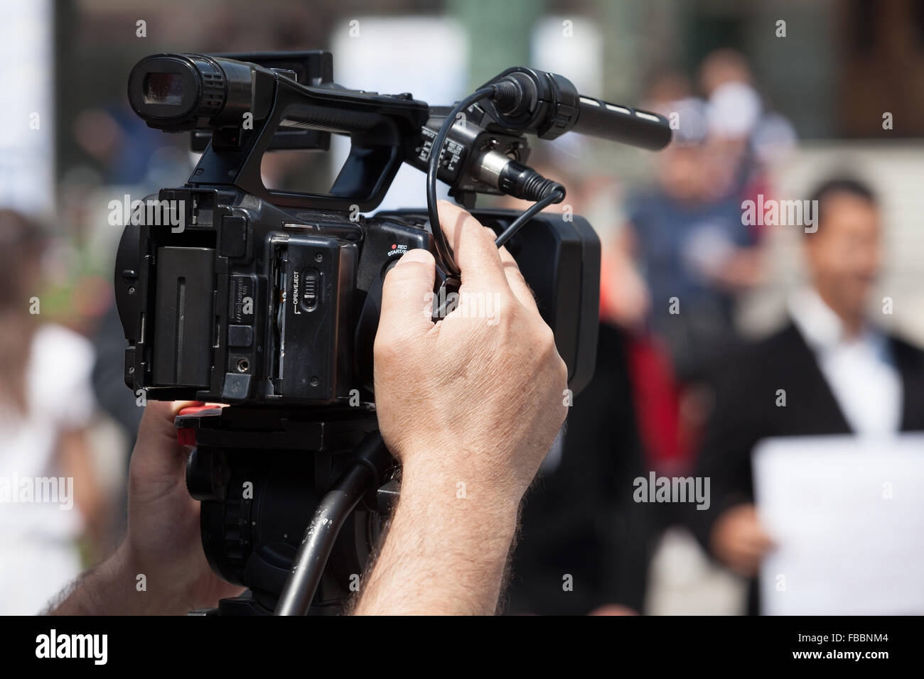 Filming demonstration with a video camera Stock Photo - Alamy