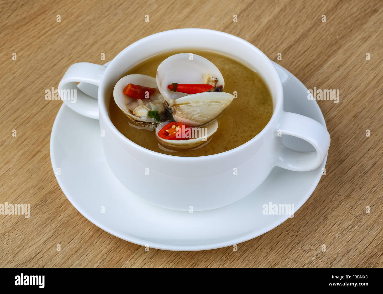 Asian traditional Shell soup on the wood background Stock Photo - Alamy