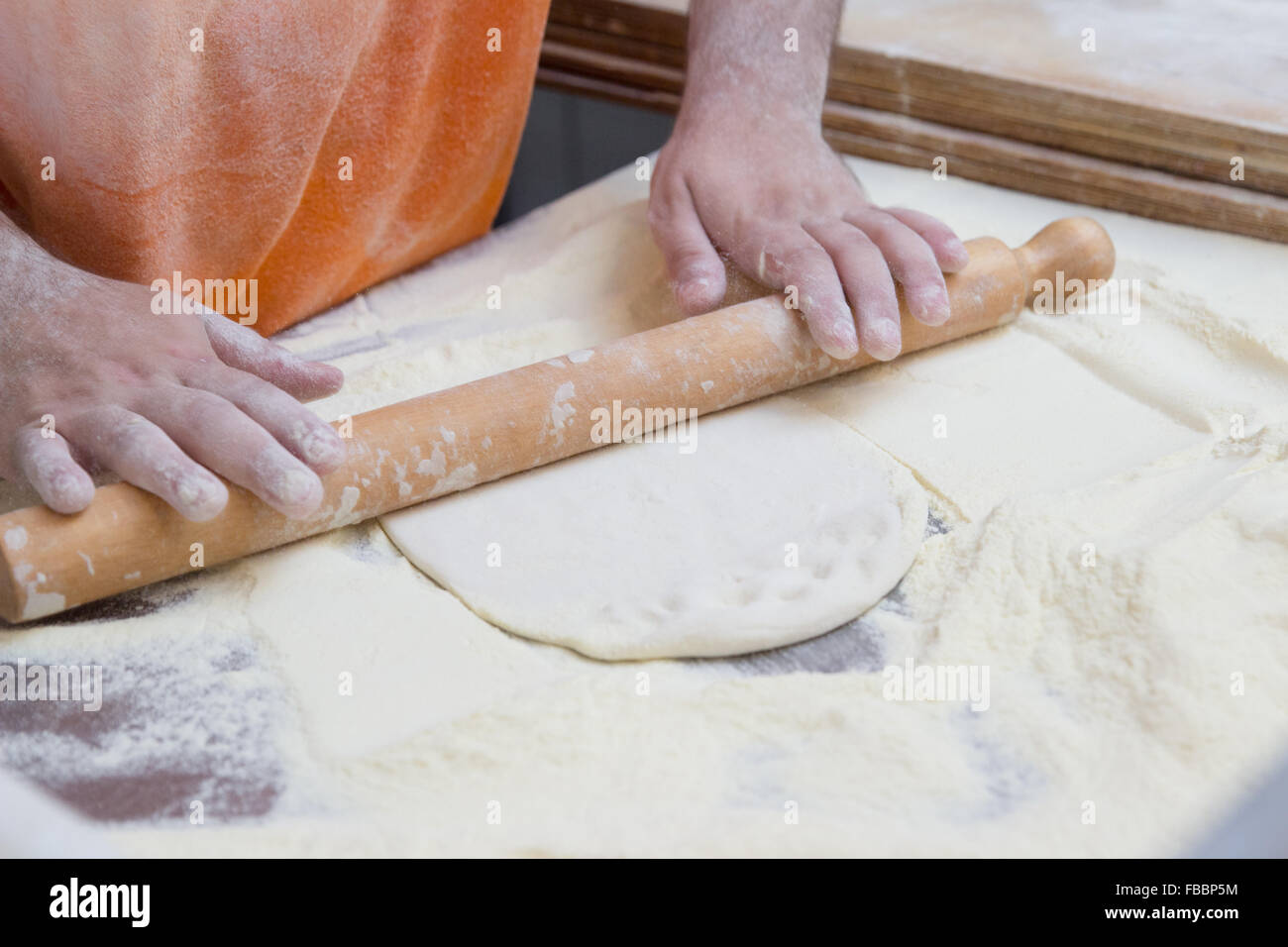 dough flour rolling-pin cooking man table kitchen Stock Photo - Alamy