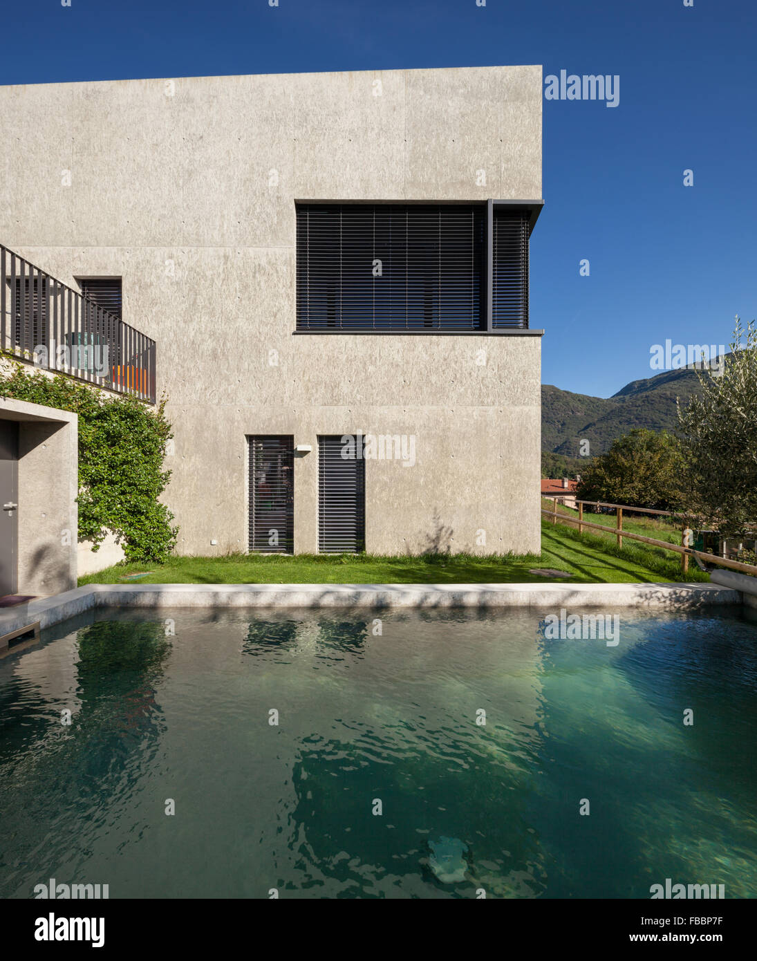 Modern house, minimalist square concrete Stock Photo - Alamy