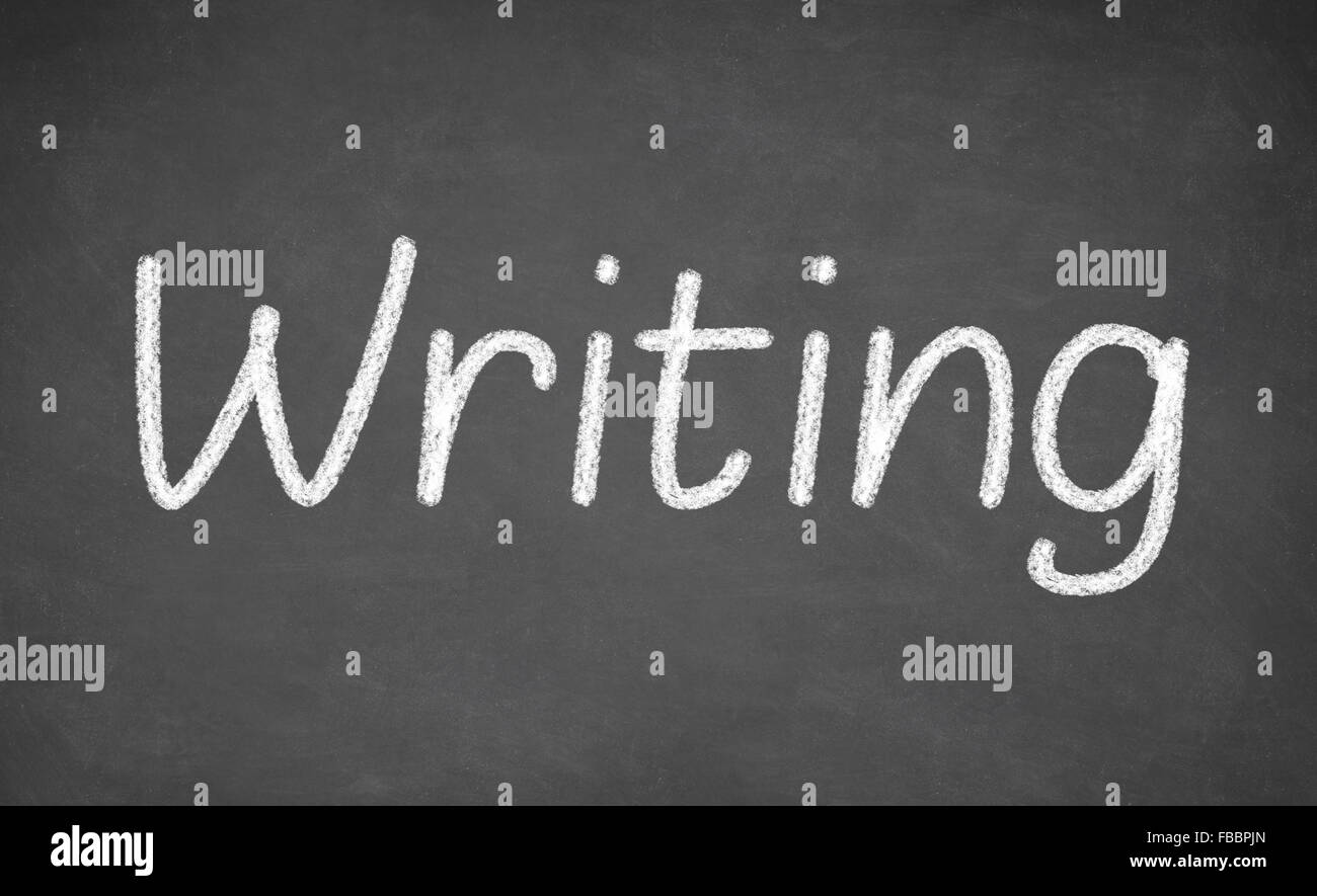Writing lesson on blackboard or chalkboard Stock Photo - Alamy