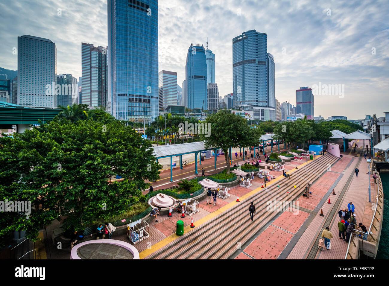 View of a waterfront promenade and skyscrapers along the Victoria ...