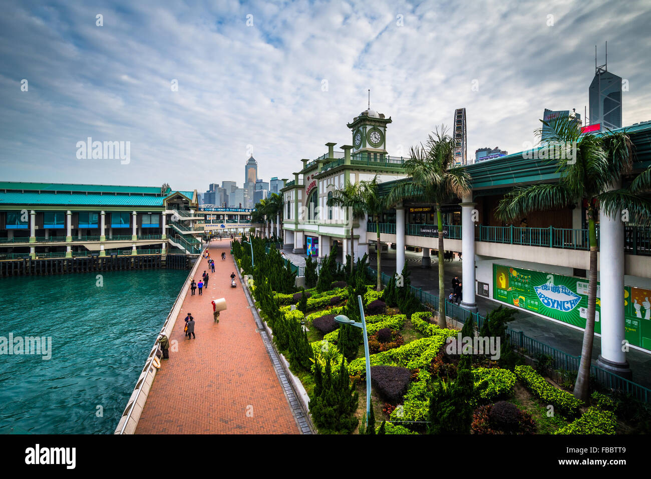 View of a waterfront promenade along the Victoria Harbour, in Hong Kong ...