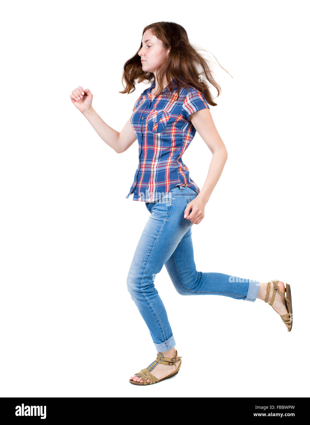 back view of running woman in jeans. beautiful blonde girl in motion ...