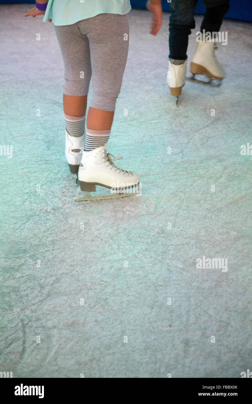 Children learning ice skating hi-res stock photography and images - Alamy
