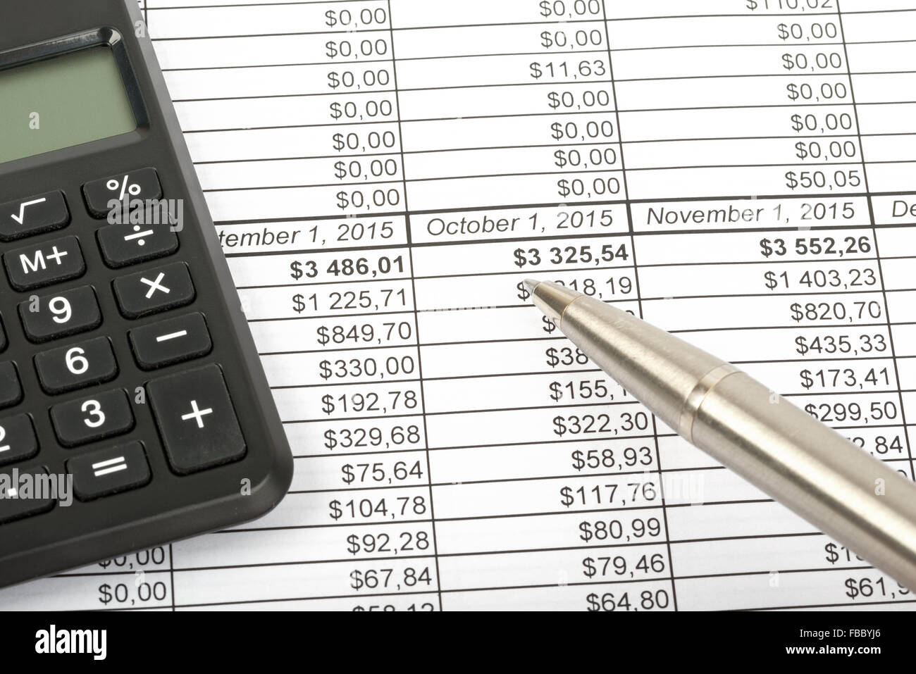 Pen with calculator Stock Photo - Alamy