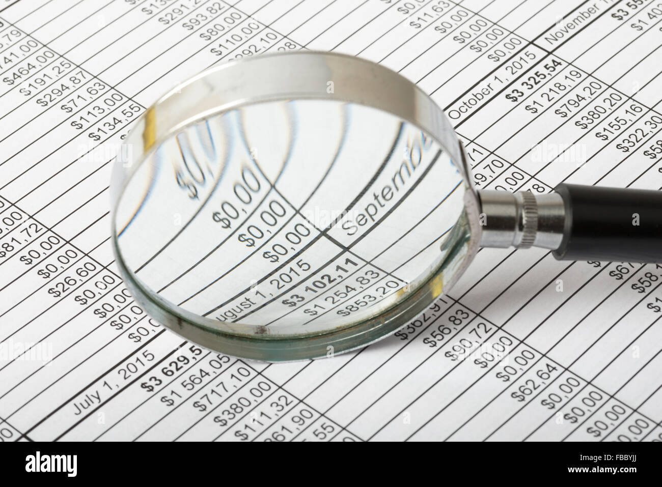 Magnifier with documents Stock Photo - Alamy