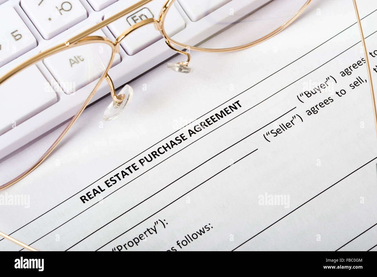 Keyboard with eyeglasses Stock Photo - Alamy