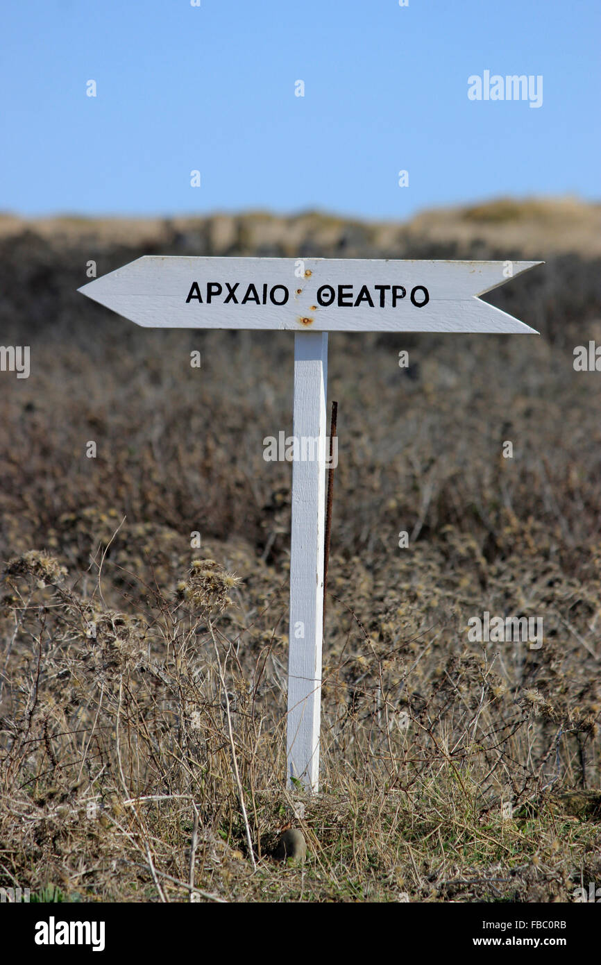 Wooden arrow sign pointing to the ancient amphitheater of the ...