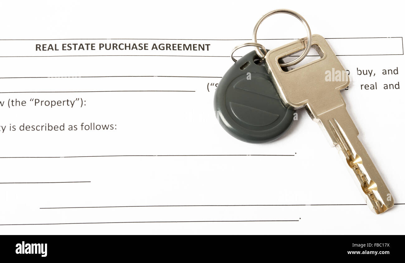 Contract with key Stock Photo - Alamy