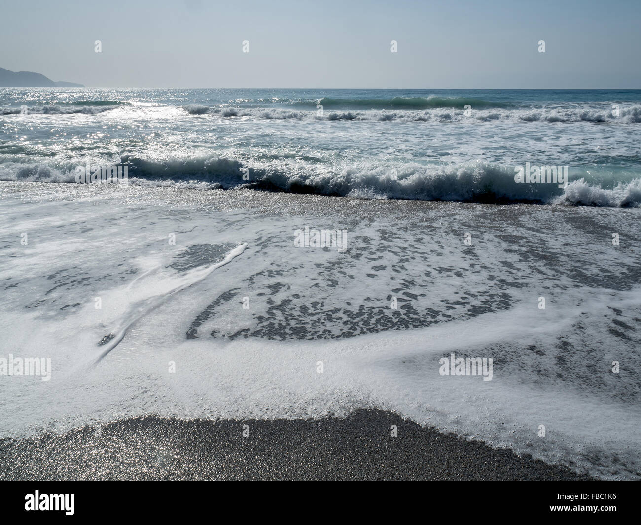 Waves and Beach Stock Photo - Alamy