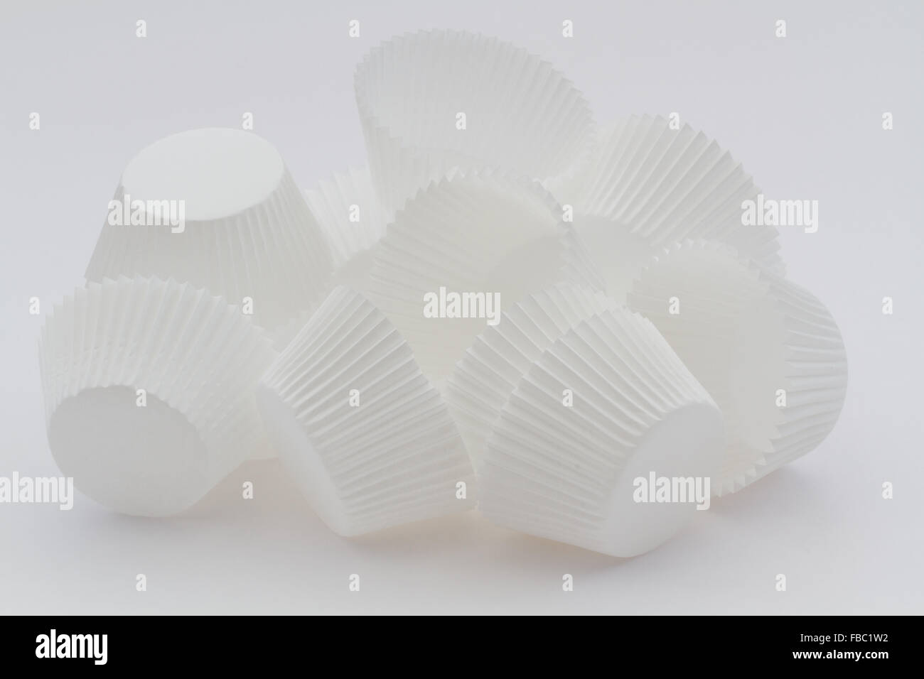 White paper baking cases filling the frame on white background Stock ...