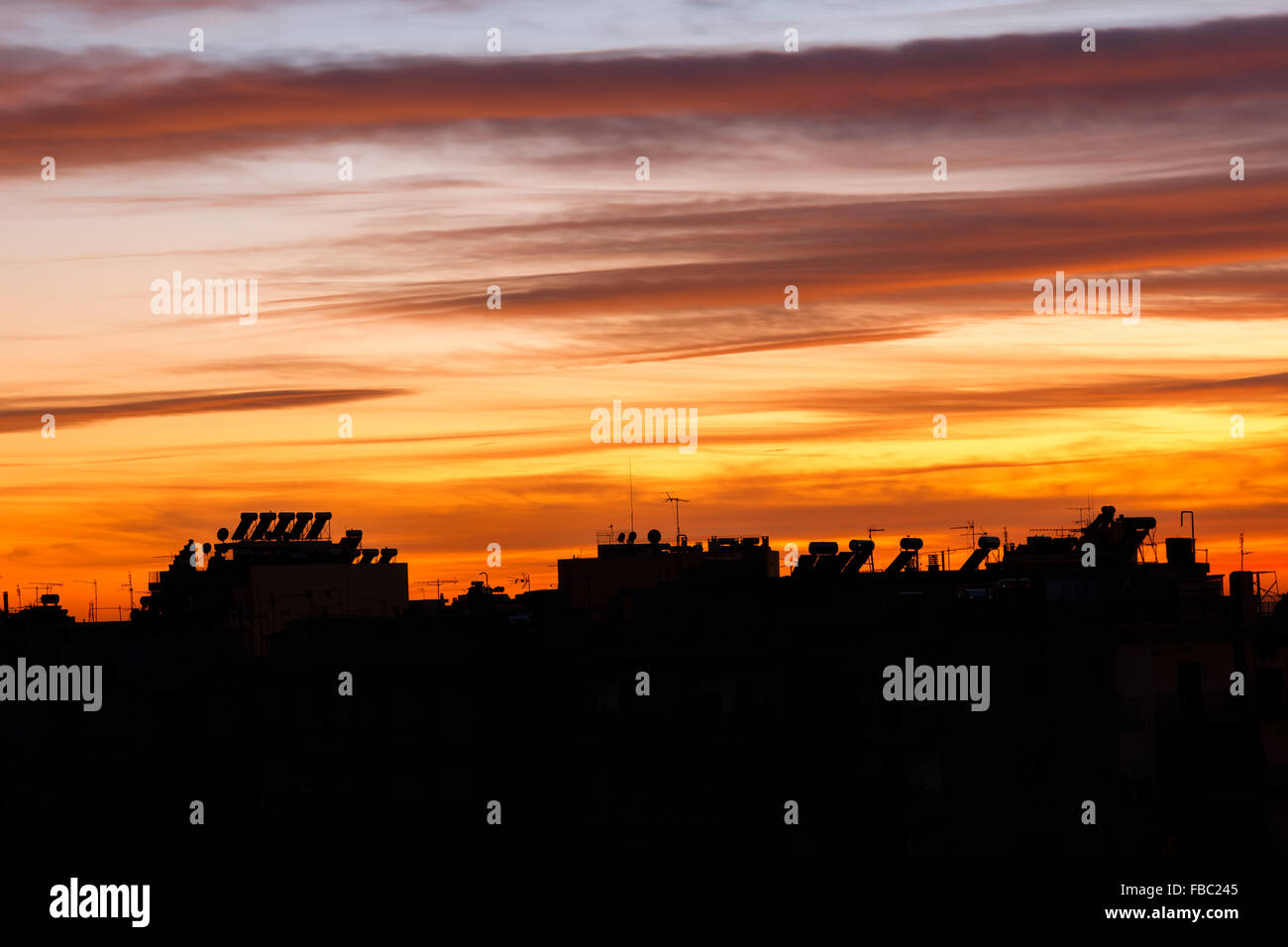 Conceptual photo of city downtown at sunrise/sunset with skyline ...