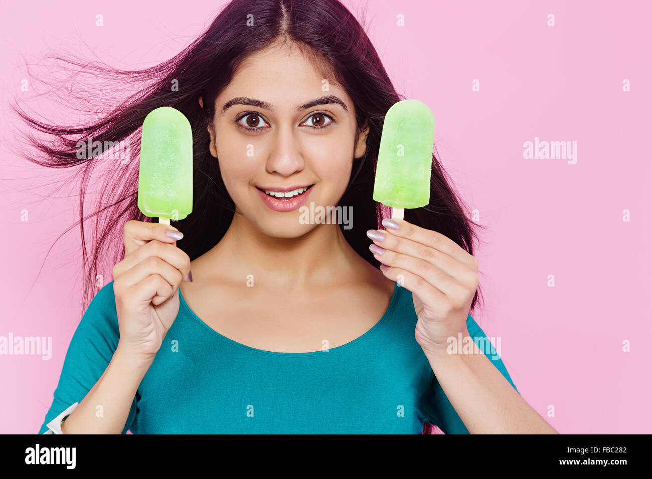 Indian young woman eating ice hi-res stock photography and images - Alamy Indian young woman eating ice hi-res stock photography and images - Alamy