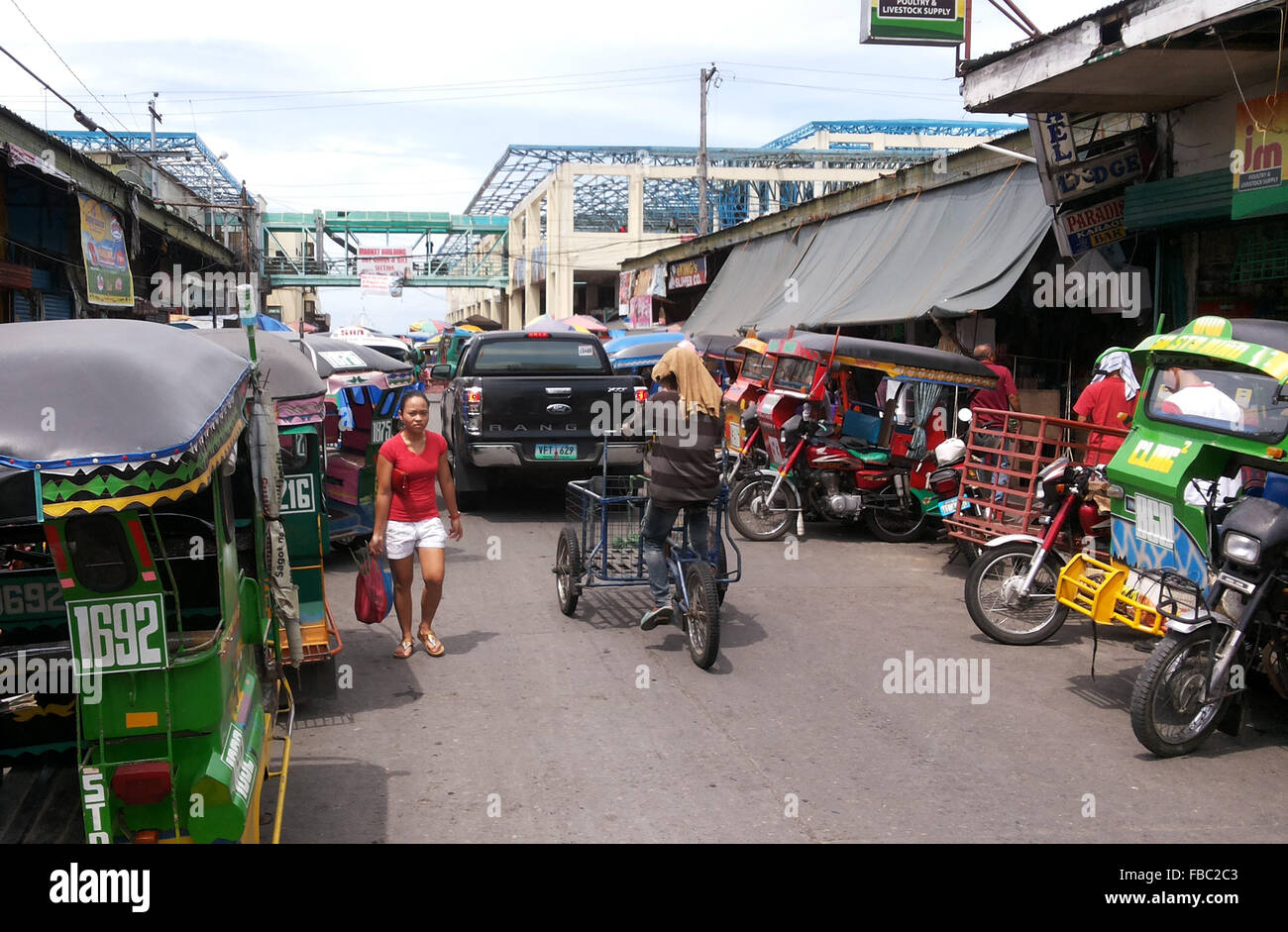 Philippines Leyte Ormoc city Motor tricycle taxis at the market Adrian ...