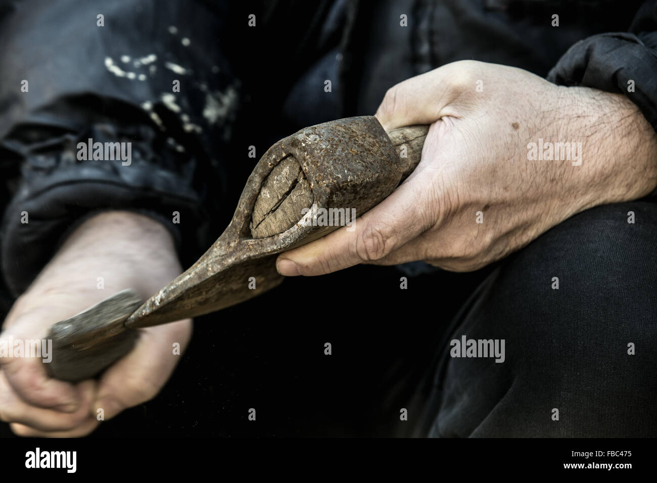 Ax blade sharpening hand close hi-res stock photography and images - Alamy