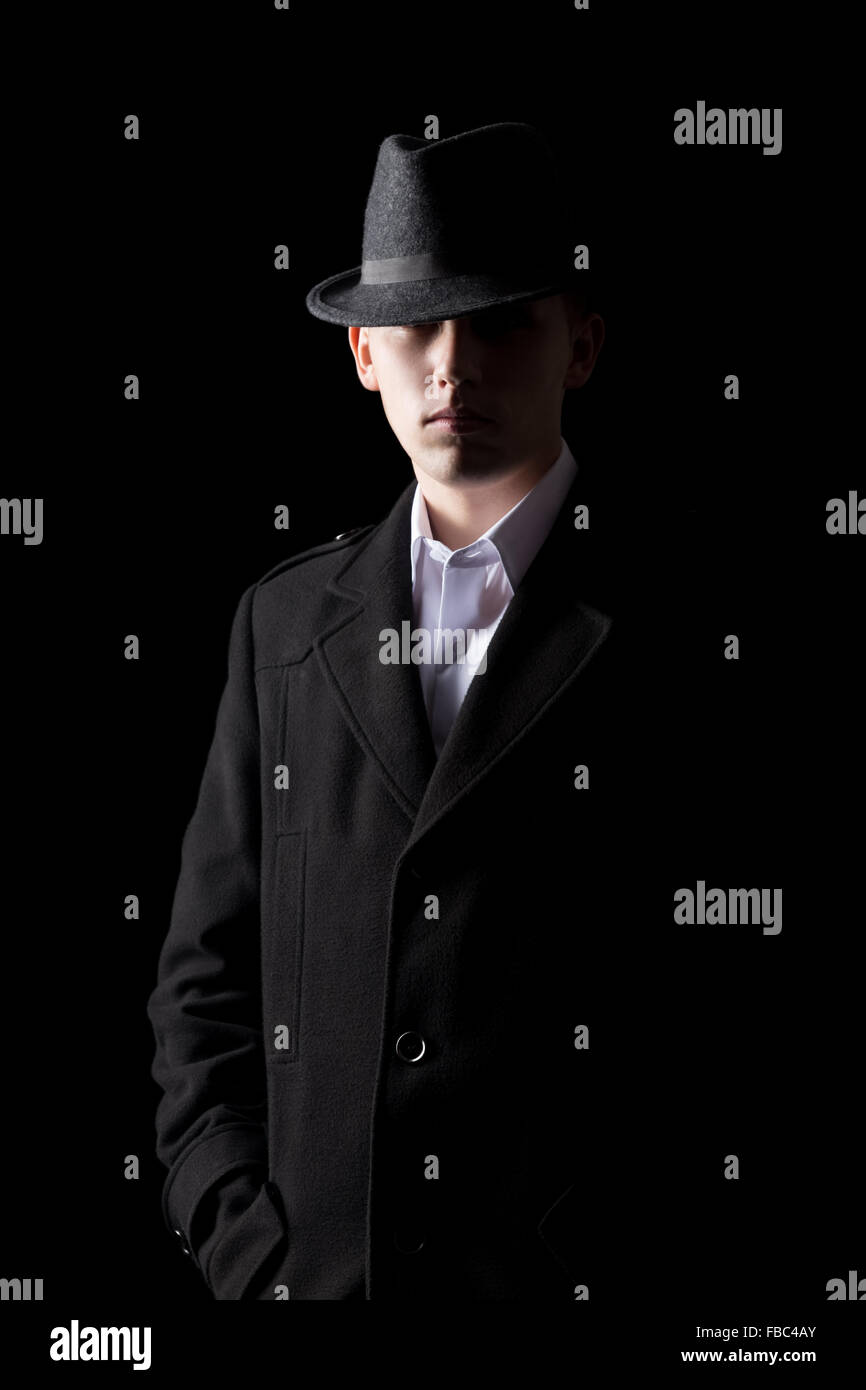 Handsome stylish man wearing hat and coat, cool, dangerous, mysterious ...