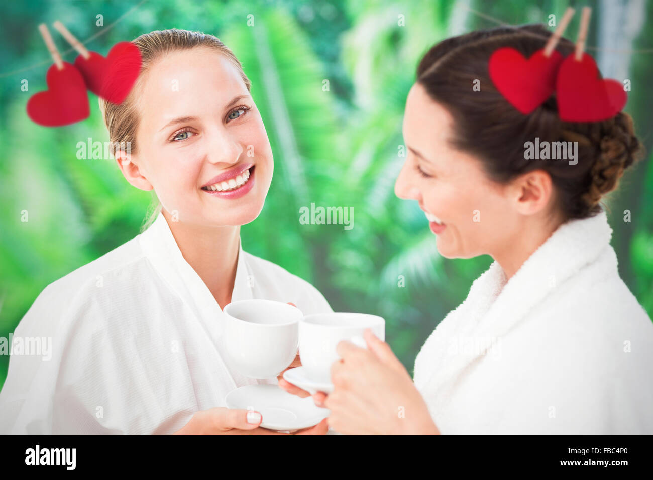 Composite image of couple friends having a spa day Stock Photo - Alamy