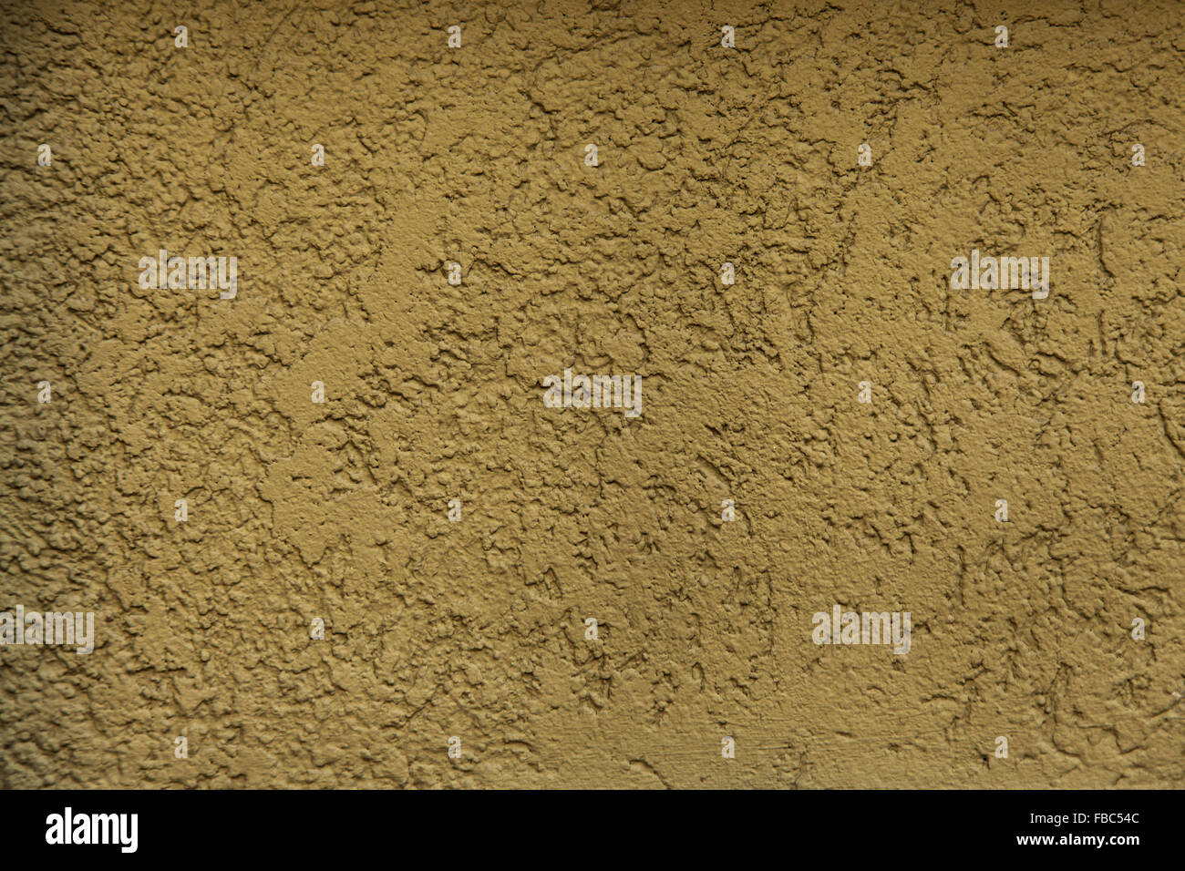 Close-up of stucco wall texture sandy color Stock Photo - Alamy