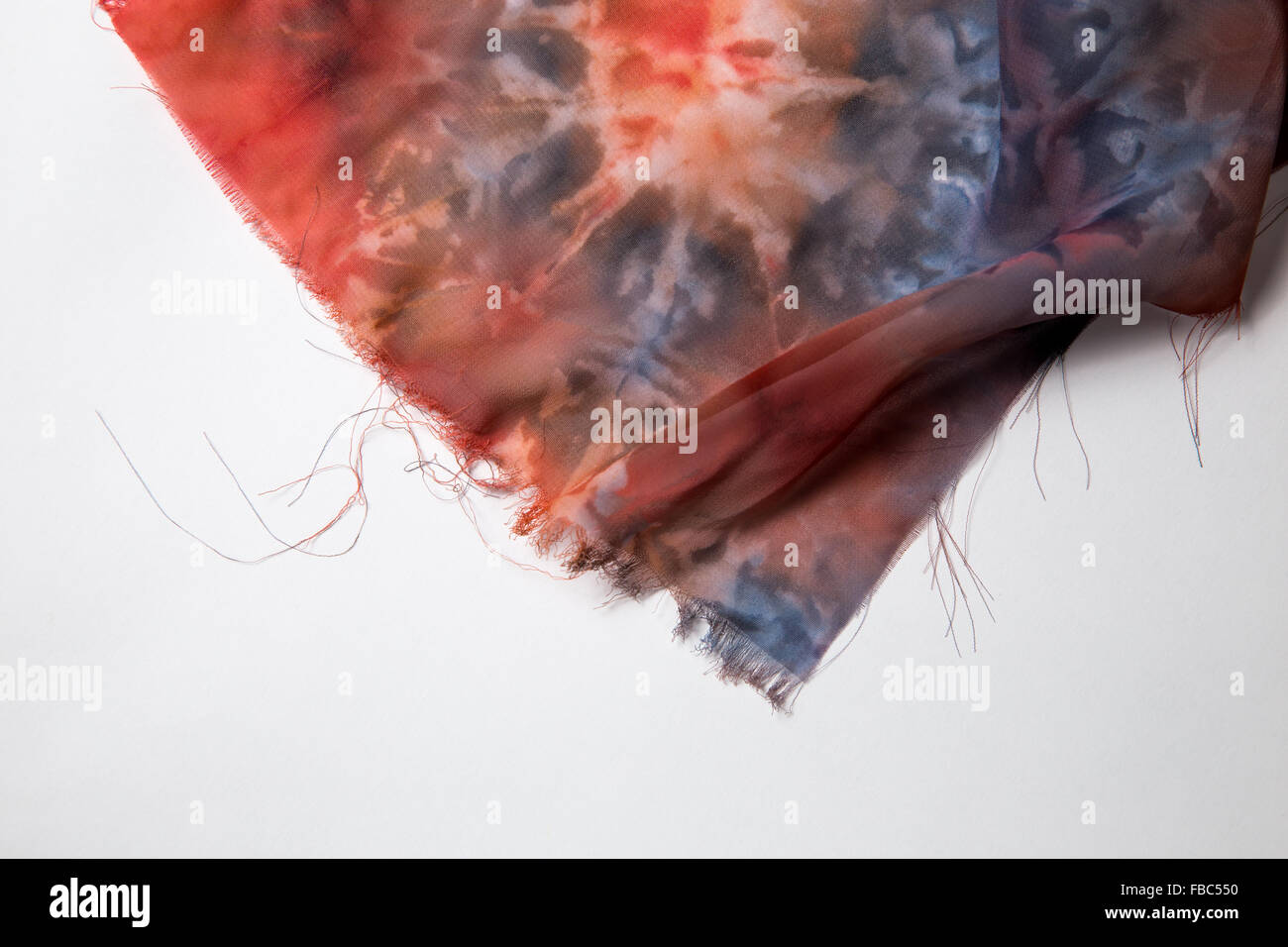 Torn edge of colorful fabric Stock Photo - Alamy