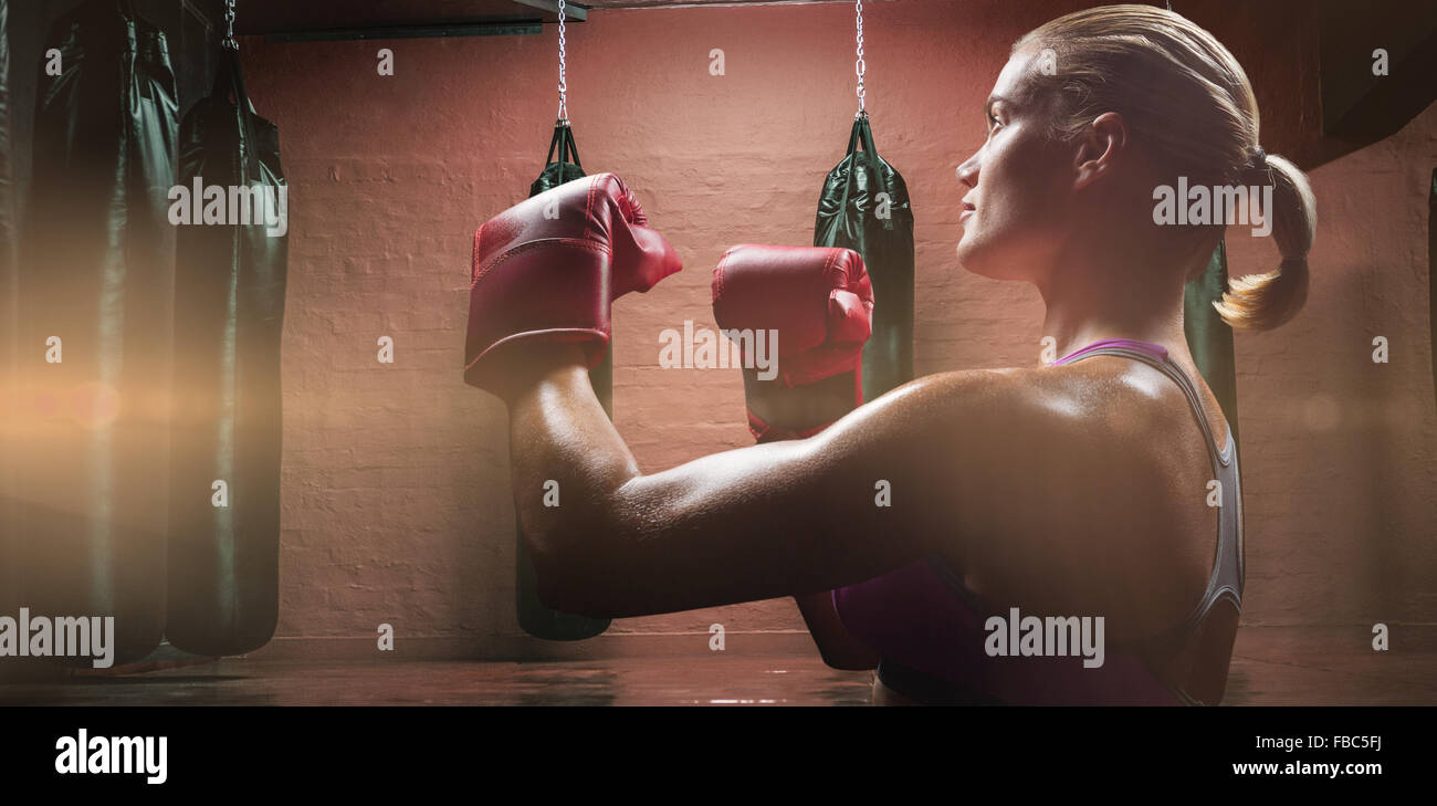 Composite image of side view of female boxer with fighting stance Stock ...