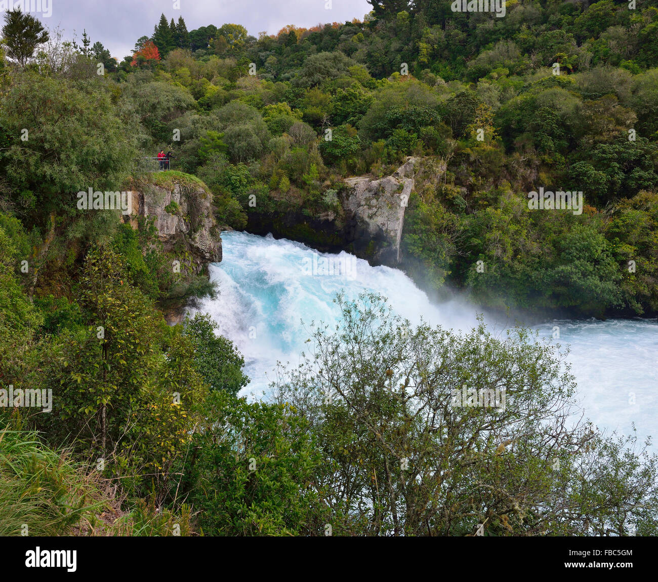 Huka Falls 2 people looking over at the phenomenon of natural hydro ...