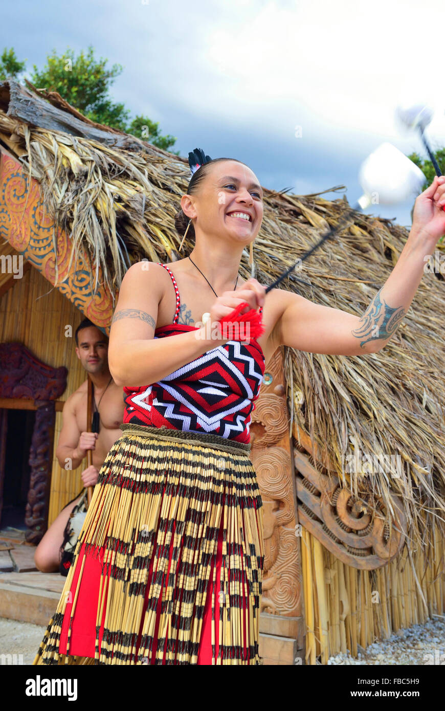 Maori woman and Maori man in Te Puia Maori Village Rotorua. Woman is ...