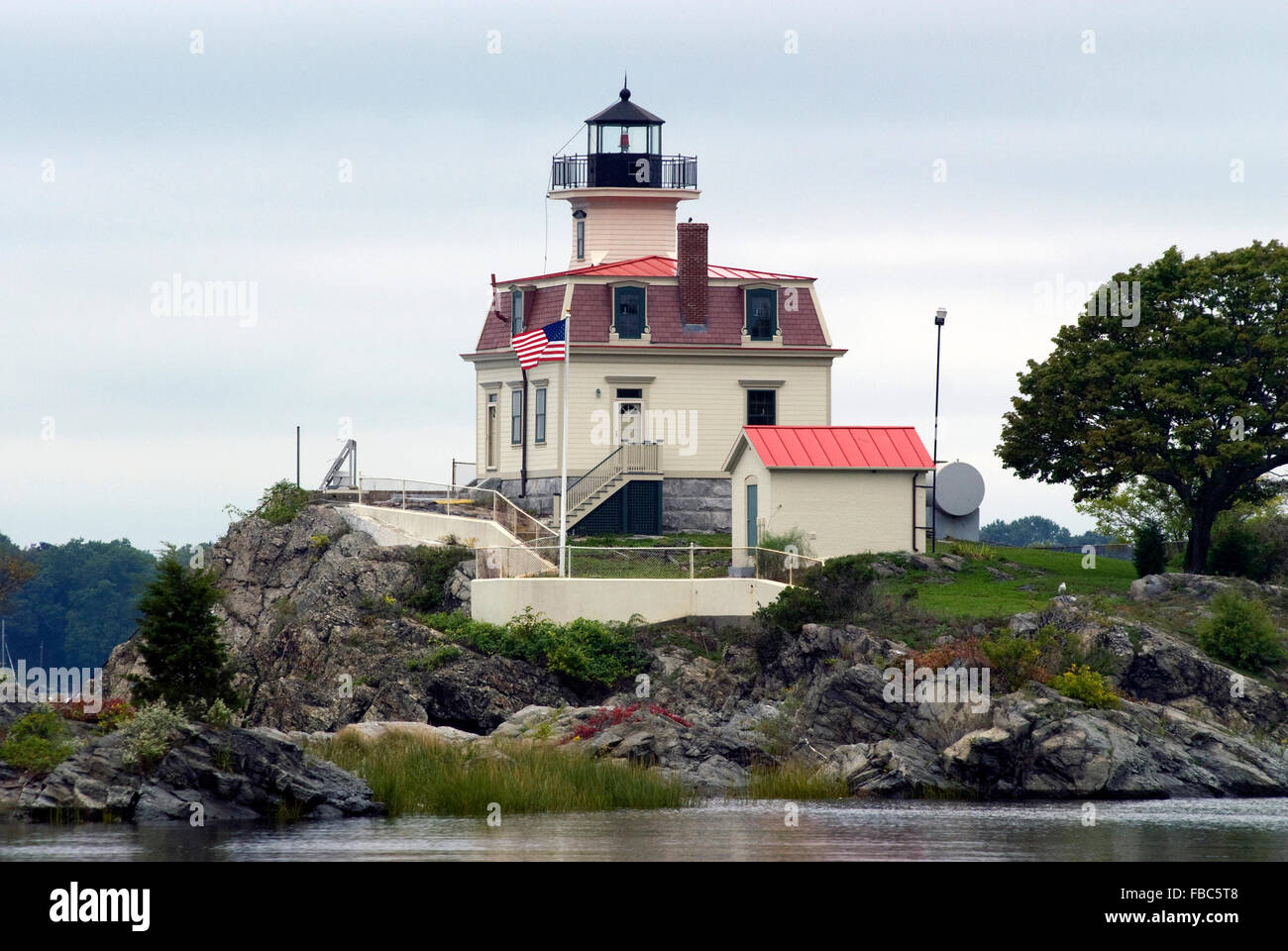 Unique architecture of Pomham Rocks lighthouse on a rocky island on an ...