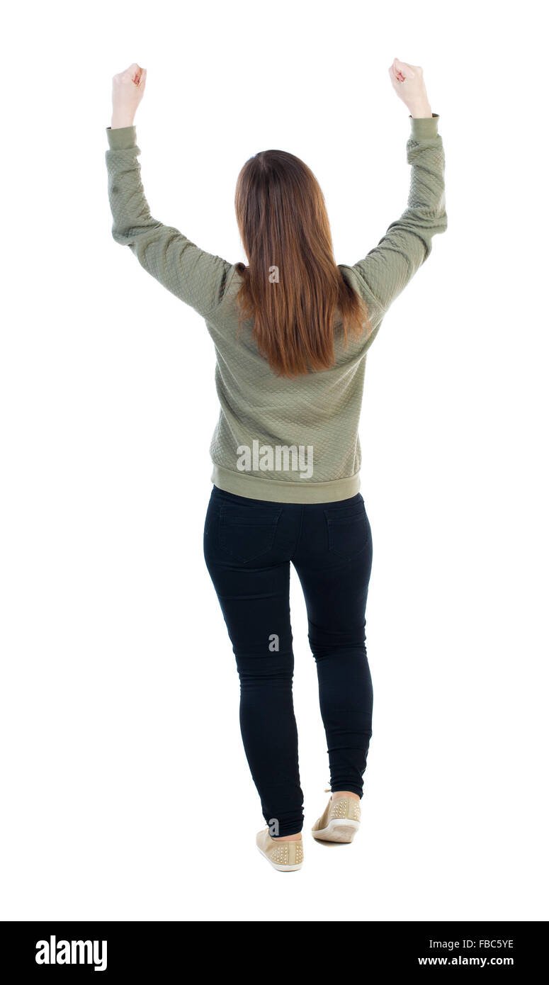 back view of dancing young beautiful woman. girl watching. Rear view ...