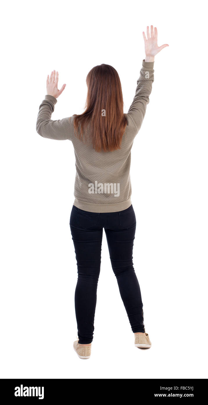 back view of dancing young beautiful woman. girl watching. Rear view ...