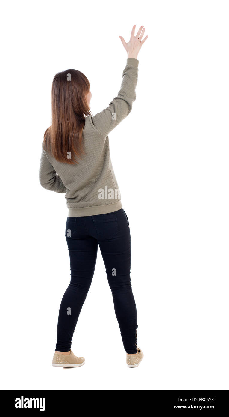 Back view of beautiful woman welcomes. Young teenager girl in dress ...