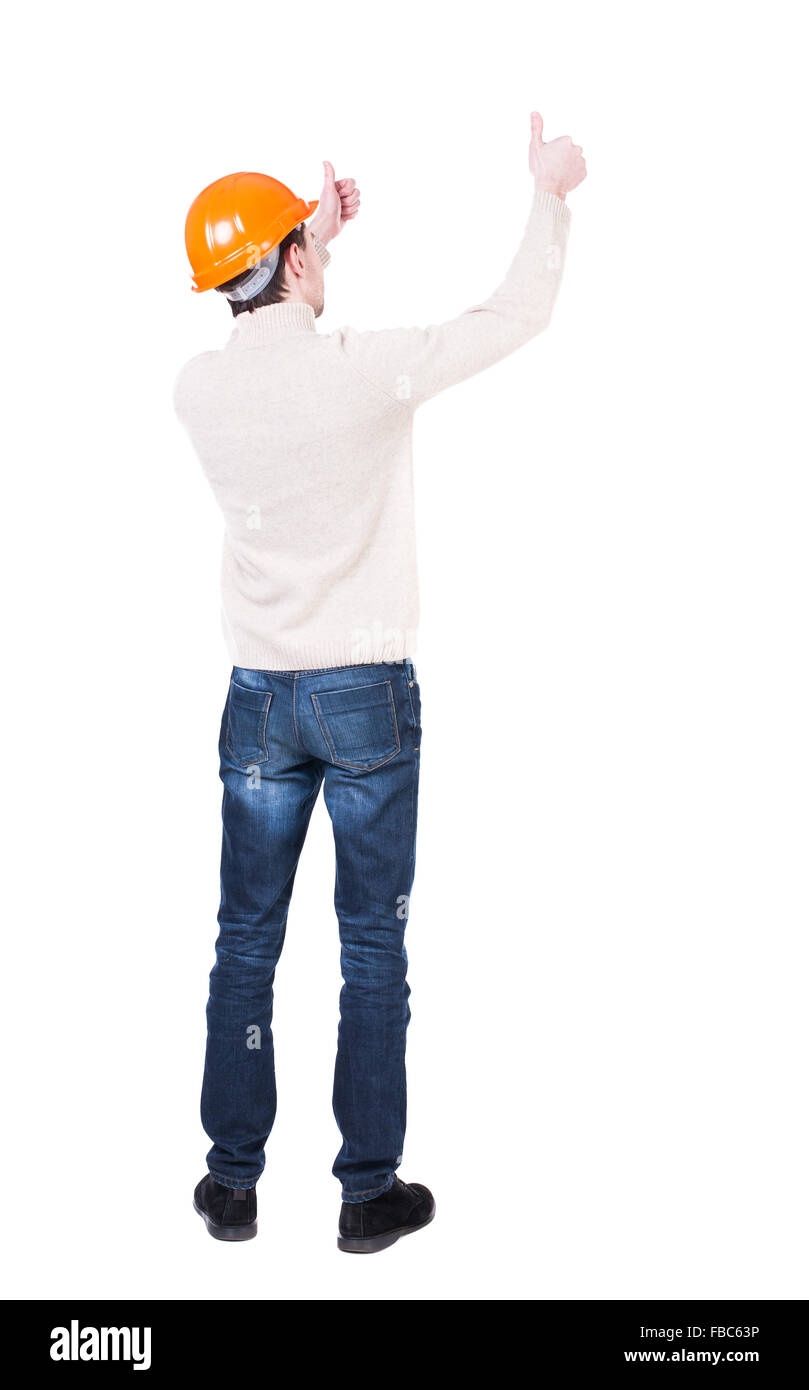 Back view of builder in helmet shows thumbs up. Rear view people ...