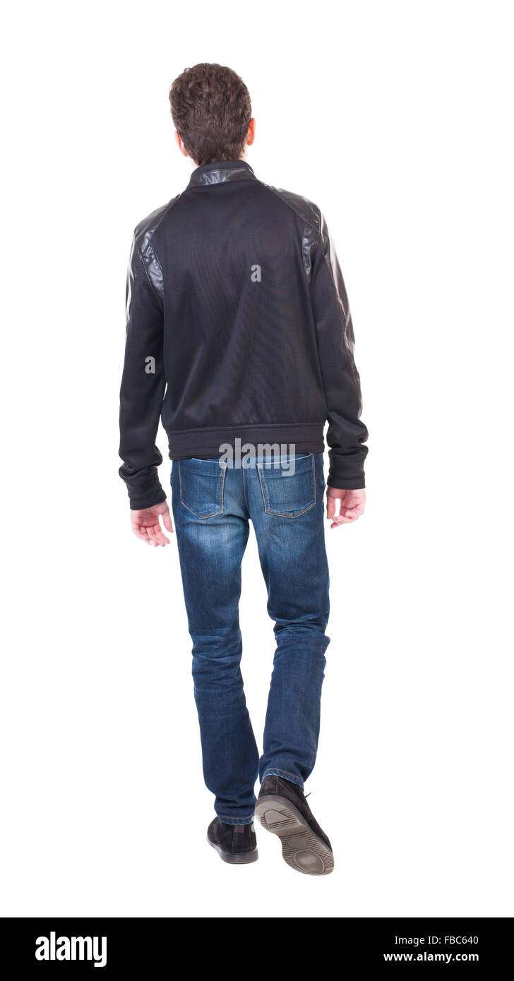 Back view of going handsome man. walking young guy . Rear view people ...