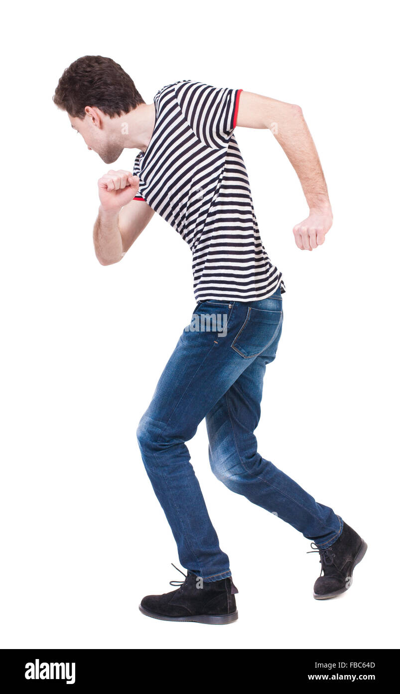 Back view of running man in brown shirt. Walking guy in motion. Rear ...