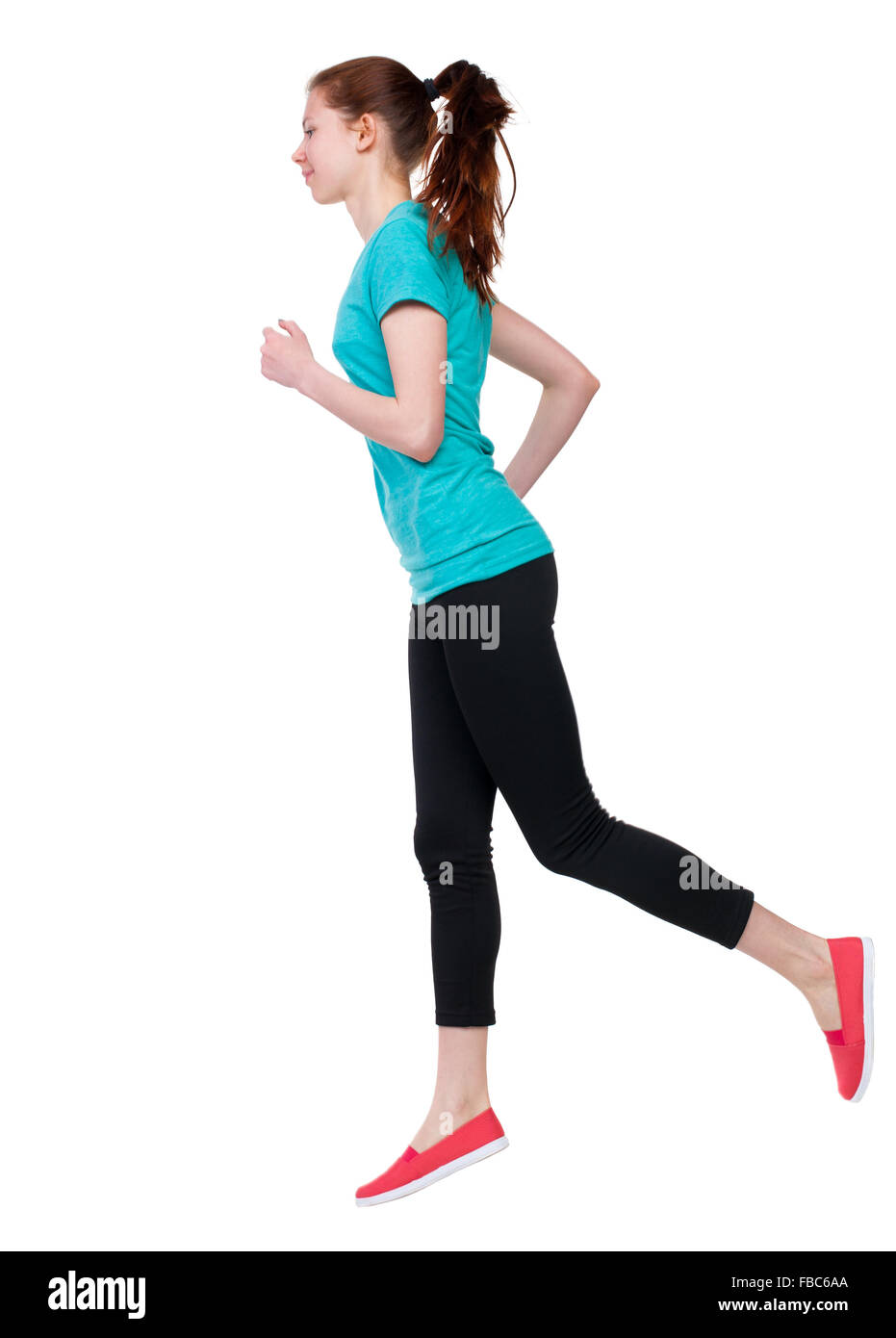 back view of running sport woman. beautiful girl in motion. backside ...