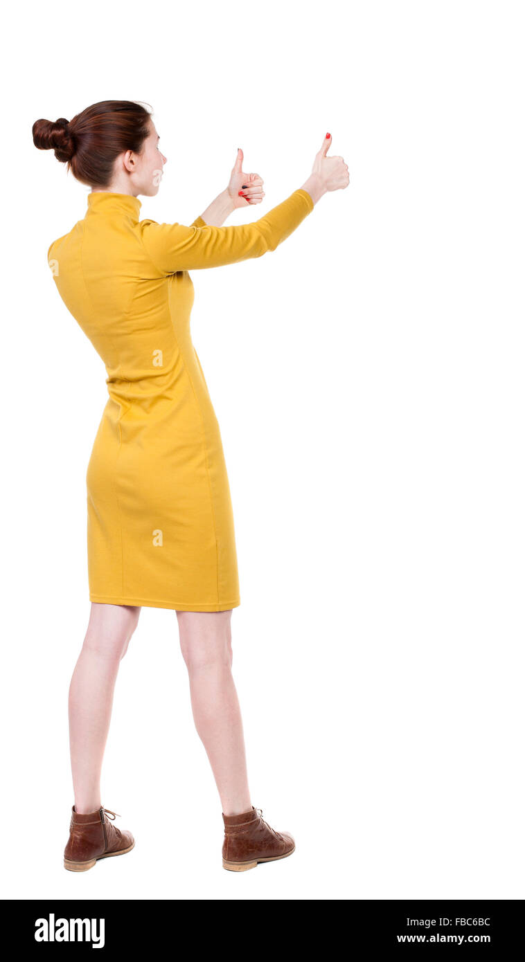 Back view of woman thumbs up. Rear view people collection. backside ...